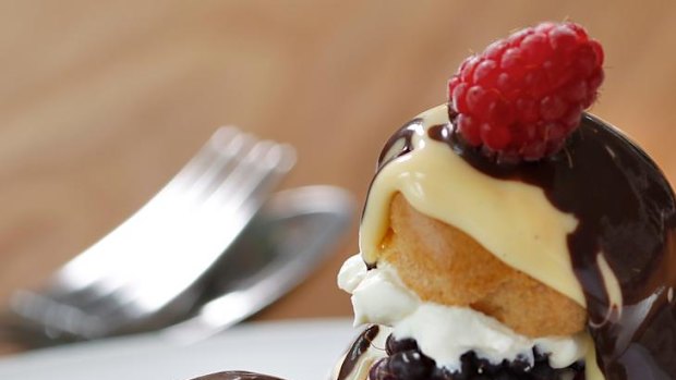 Profiteroles with a burst of berries