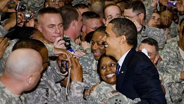 Hugs, smiles for Obama on Iraq troop visit