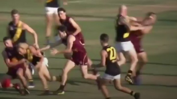 Sydney premiership captain Barry Hall caught punching football ...