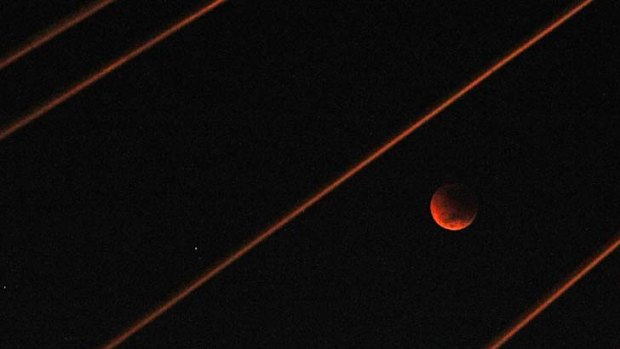 Blood red moon shines over Sydney
