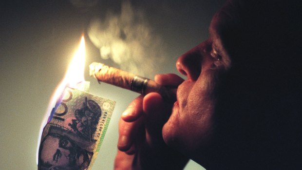 Burning cash: why some people destroy money