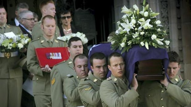 Mourners recall singular act of a brave soldier