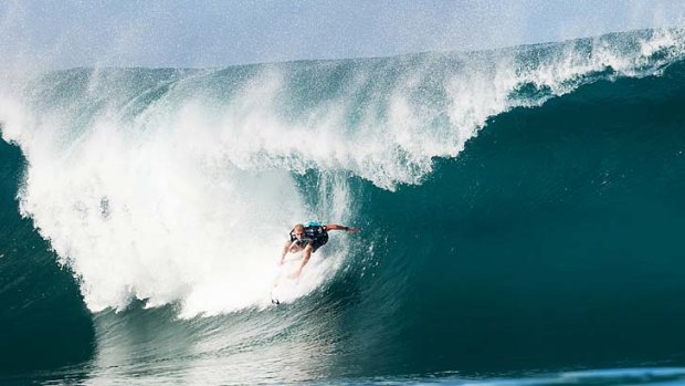 Mick Fanning wins third world surfing title