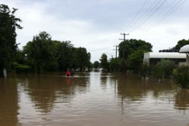 Rainfall records tumble as storm heads south