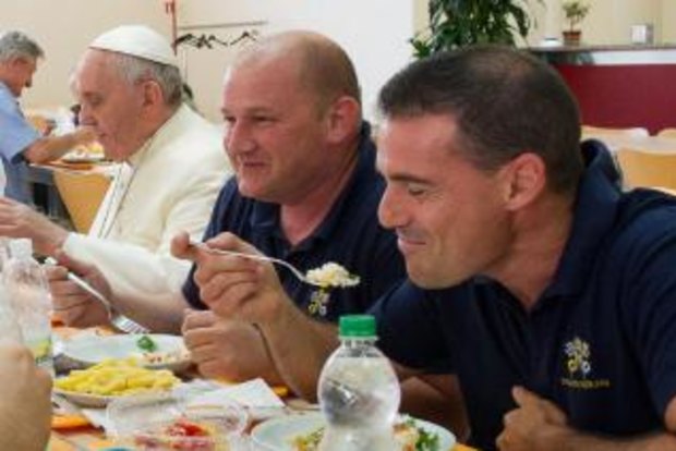 Pope Francis surprises workers with lunch in Vatican cafeteria