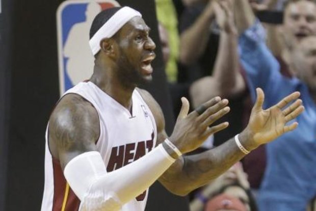 LeBron James stopped at the rim by Mason Plumlee and Brooklyn Nets