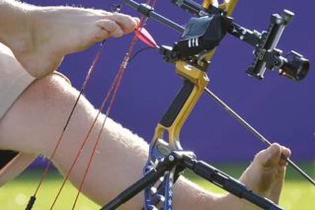 No arms, but archer is on target