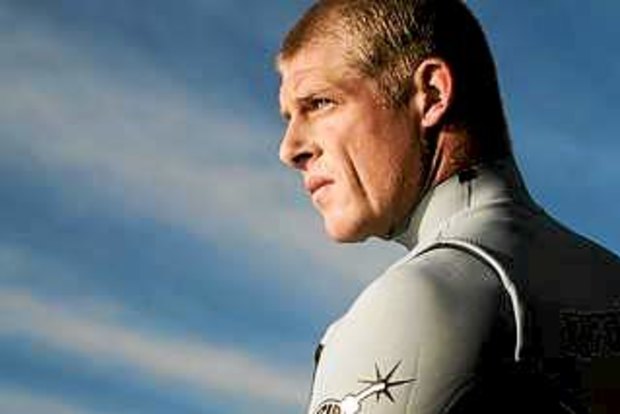 Mick Fanning wins third world surfing title