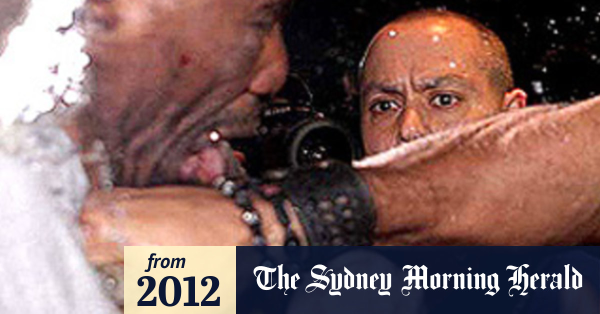 Fight in ring overshadowed by violence out of it as punches fly at ...