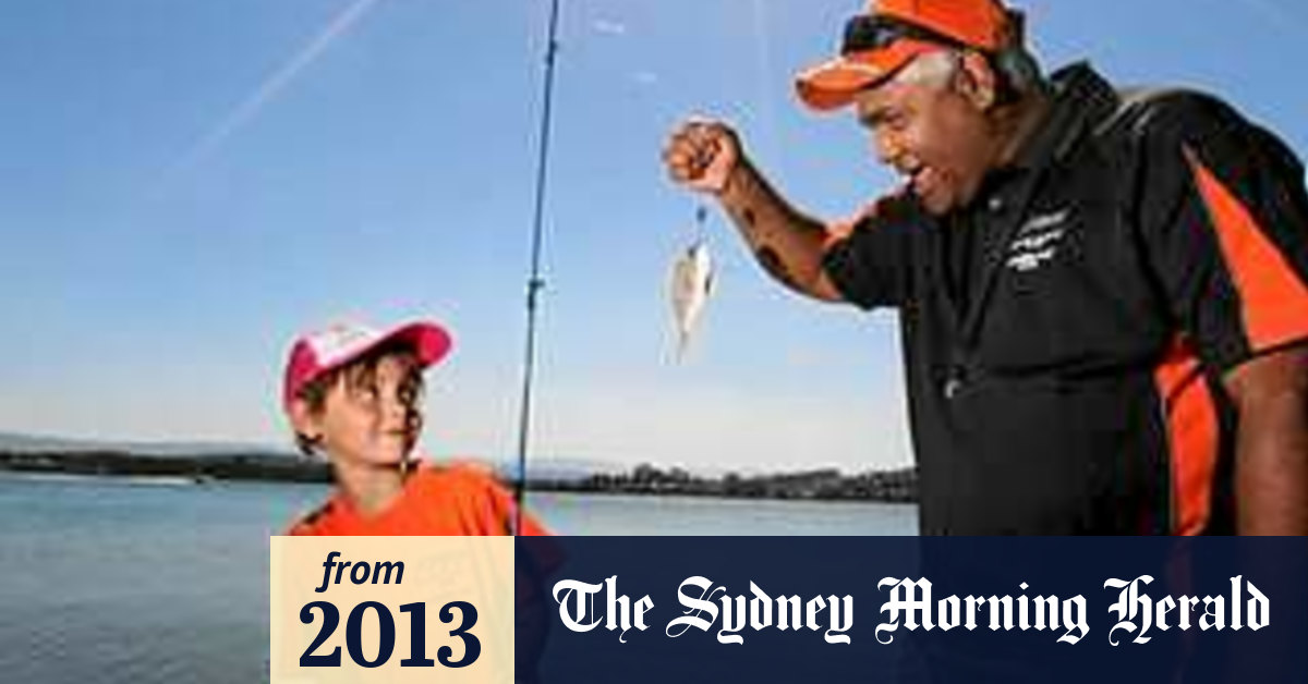 Indigenous children fishing for a link to the past from elders