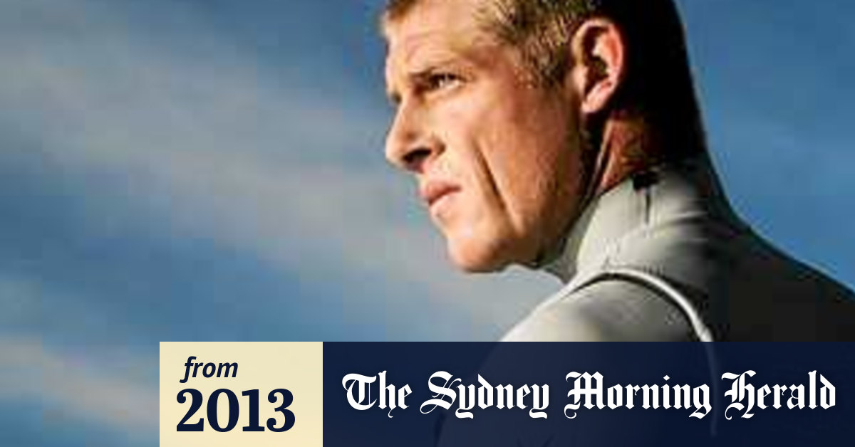 Mick Fanning wins third world surfing title