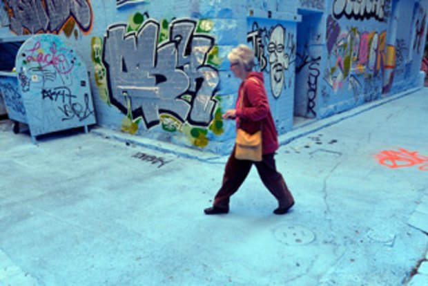 Artist Adrian Doyle paints Rutledge Lane blue