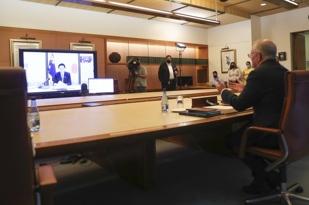 Japan and Australia sign landmark defence deal as PMs meet