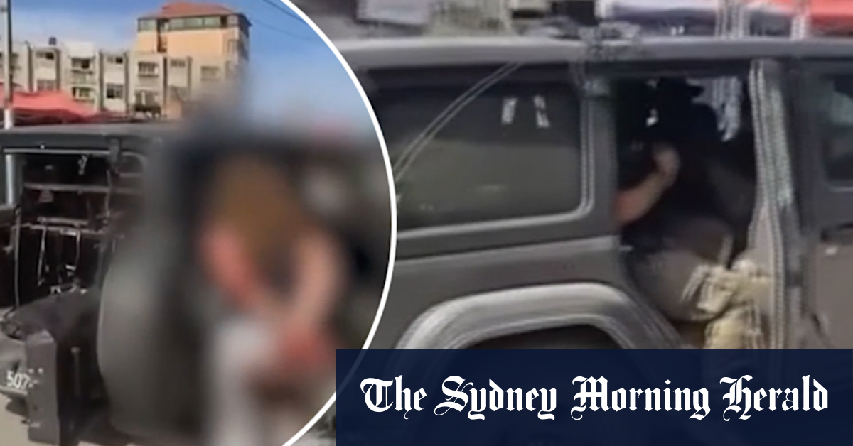 Video: Video appears to show Hamas taking woman hostage