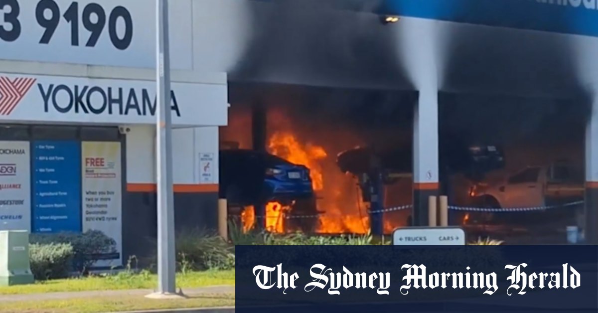 Video: Man fighting for life after fire breaks out at Queensland tyre shop
