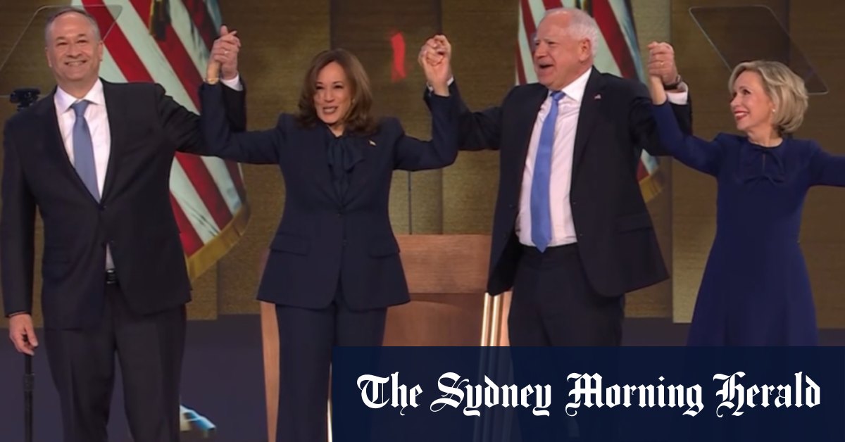 Kamala Harris, Doug Emhoff, Tim Walz and Gwen Walz hold hands – Robert