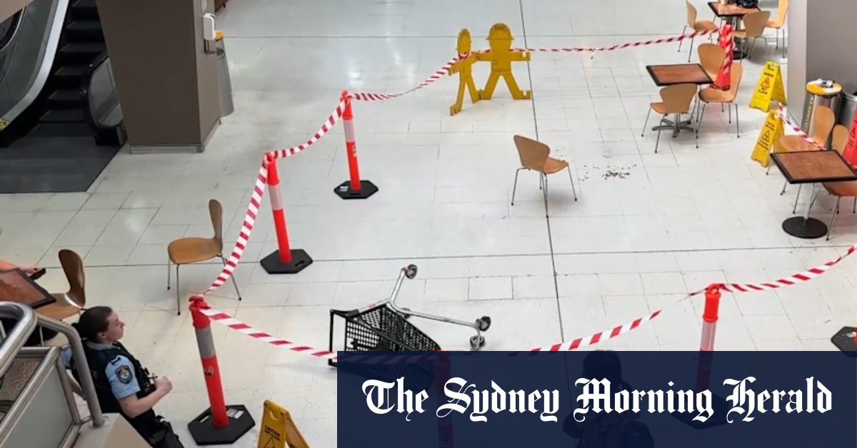 Video: Teenager arrested after man hit by falling trolley