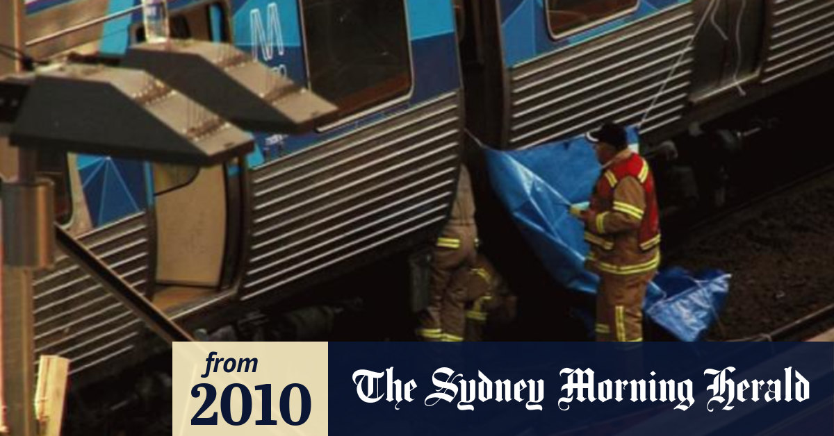 Video: Woman trapped under train