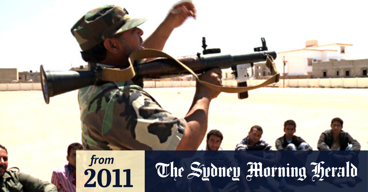 Video: Libyan rebel teens learn to fire a rocket launcher