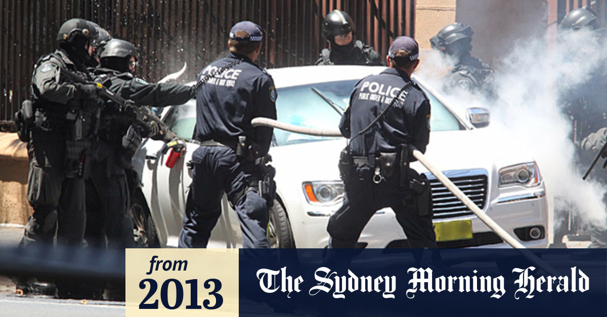 Video: Armed police drag man from car