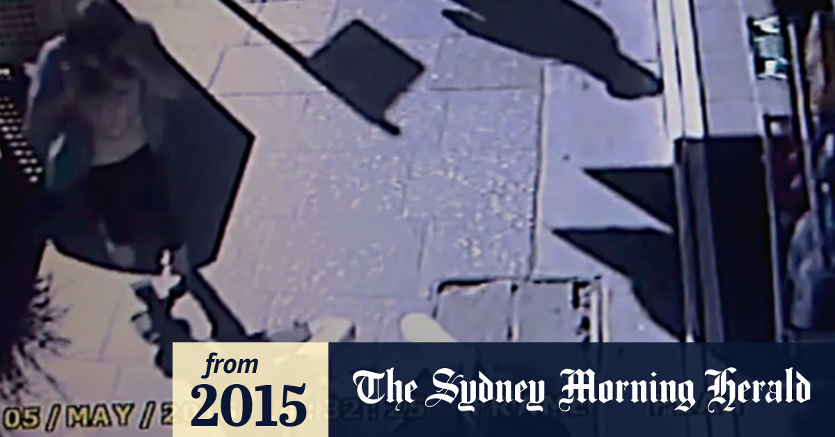 Video: CCTV: Burwood woman hit by falling sign