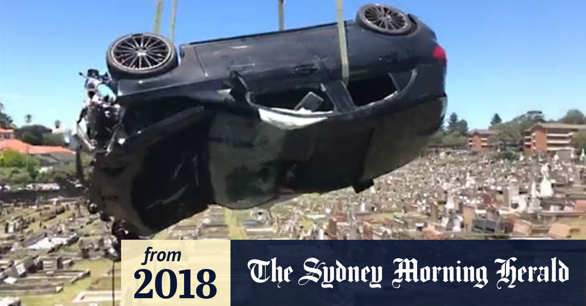 Video: Dramatic video shows car crashing into cemetery