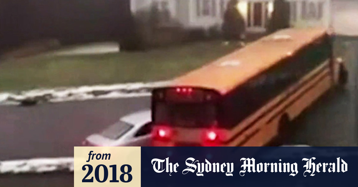 Video: Out-of-control school bus slides down icy road