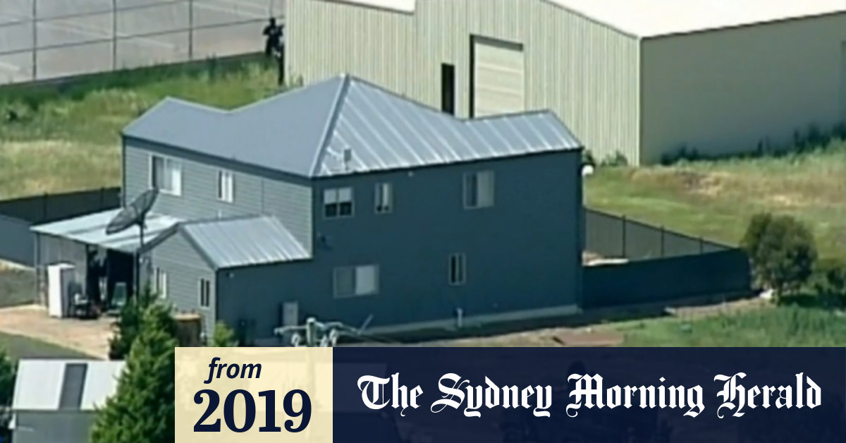 Video: Armed police surround rural Victorian compound