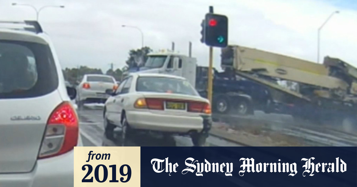 Video: Shocking dashcam footage of truck running red light