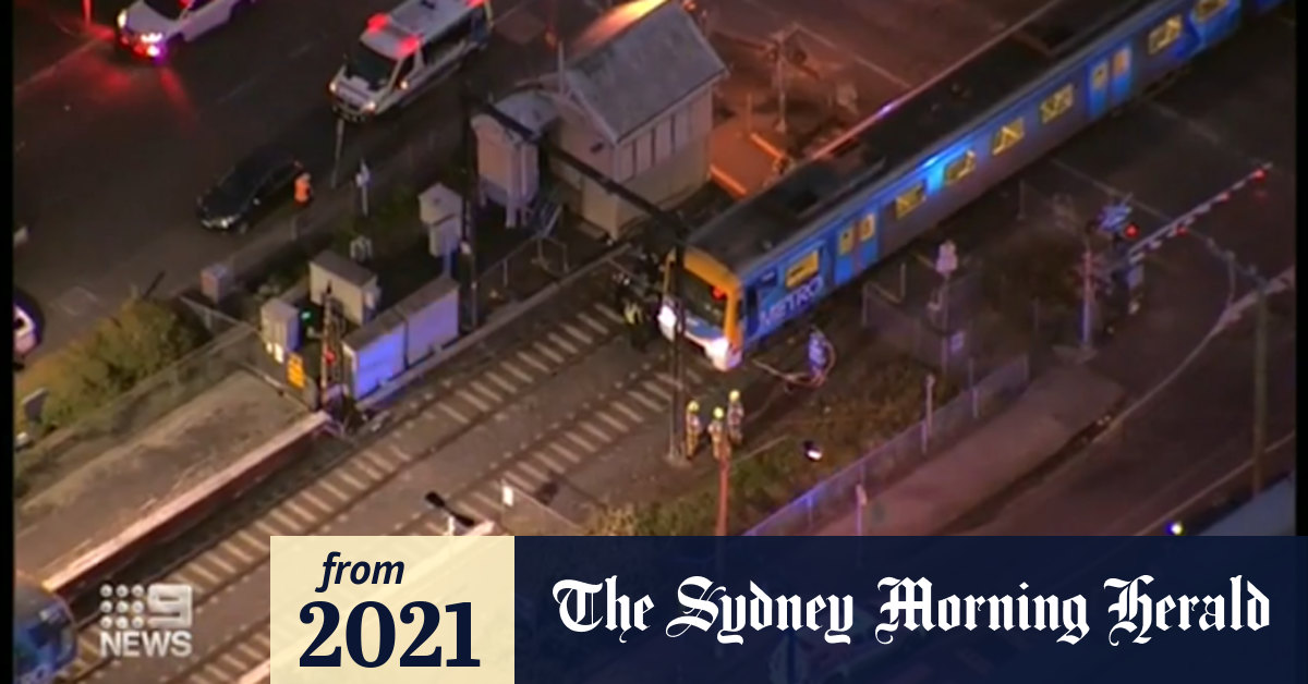 Video: Train crashes into car stuck on tracks in Melbourne