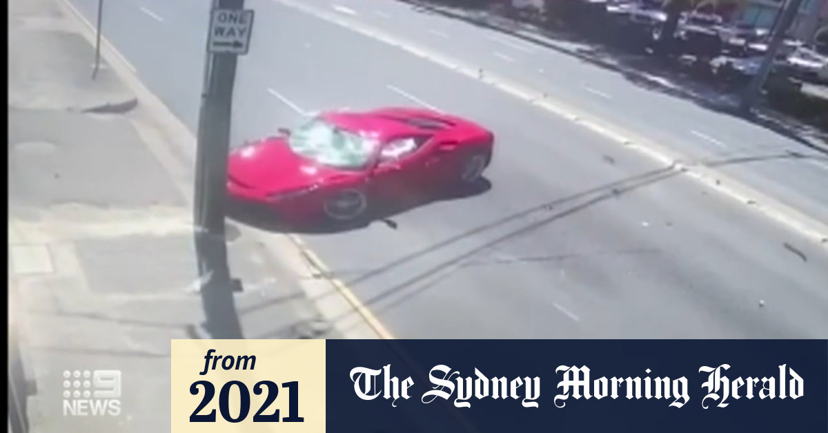 Video: Ferrari crashes into power pole on Sydney highway