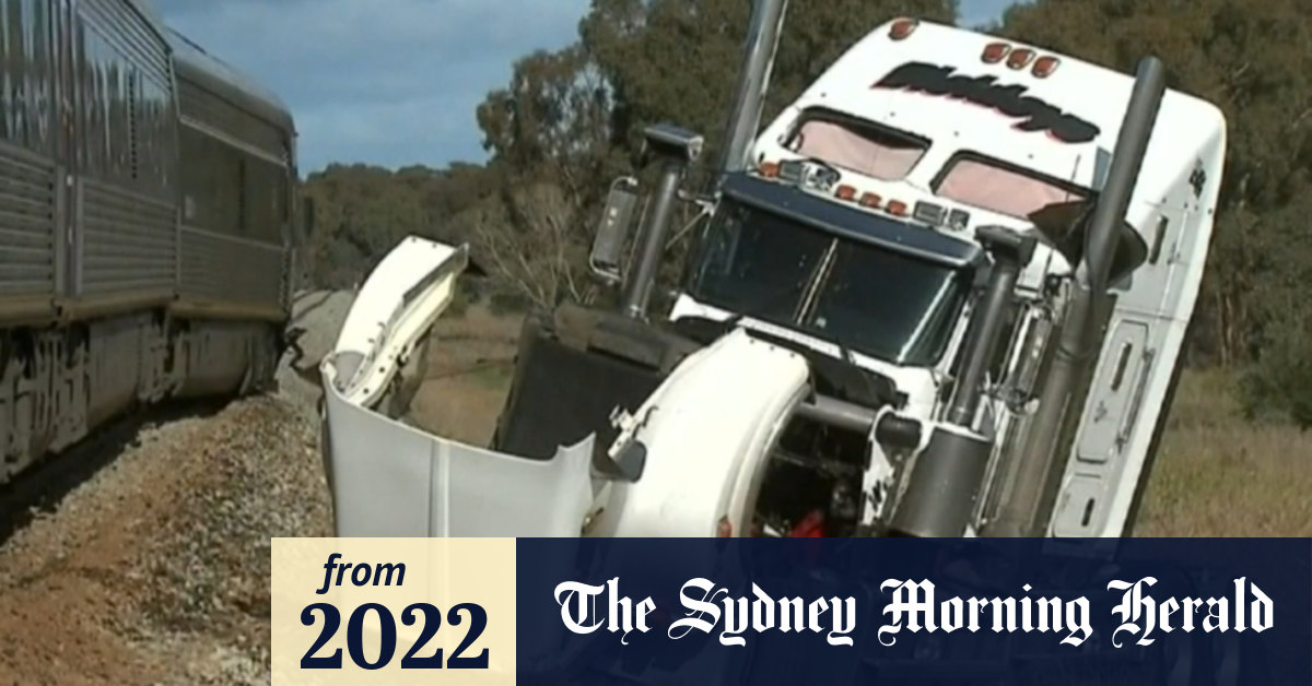 Video: Two people injured after truck and train collide in central Victoria