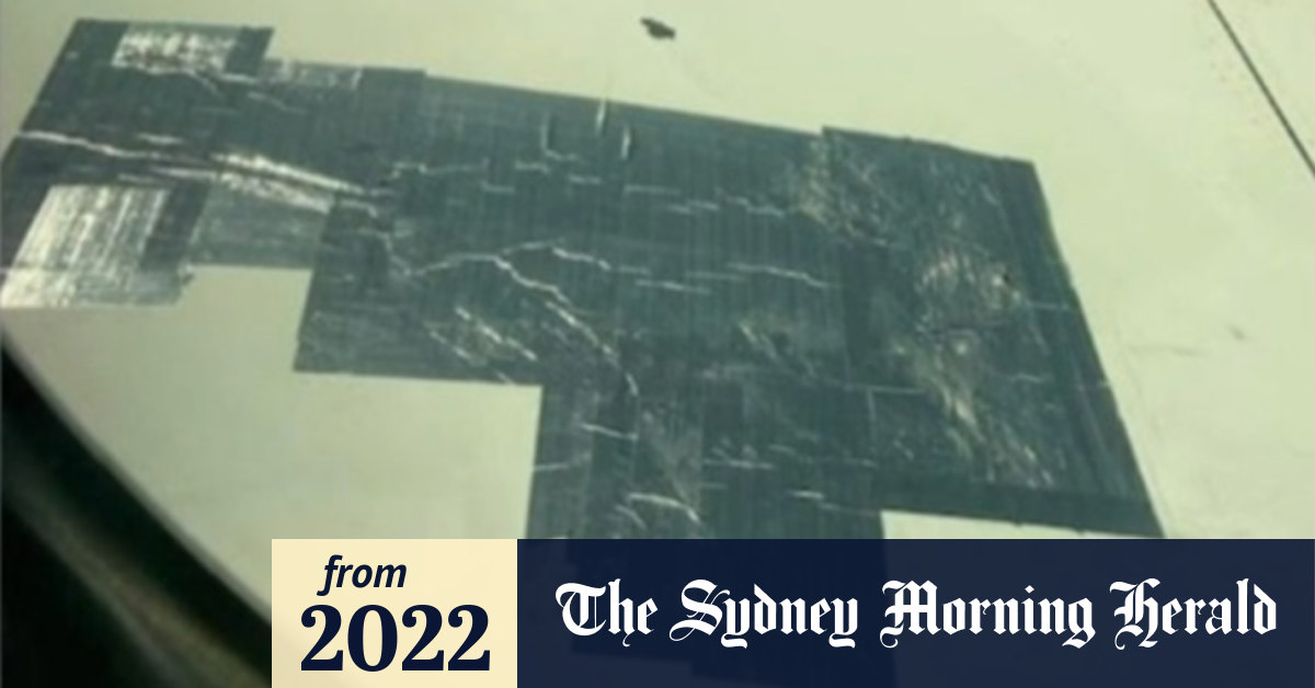 Video: Passenger concerned after spotting tape on wing of plane