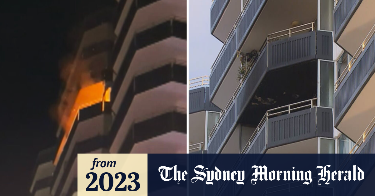 Video: Man filmed scaling building after escaping fire on the Gold Coast