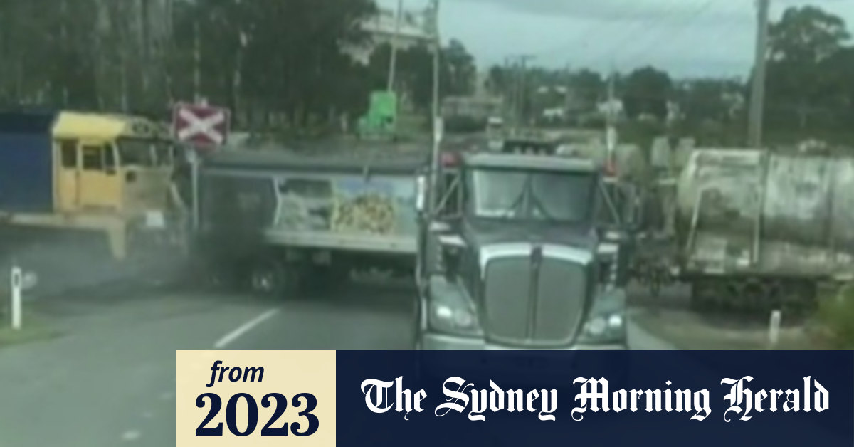 Video: Freight train and truck crash causes rail line delays