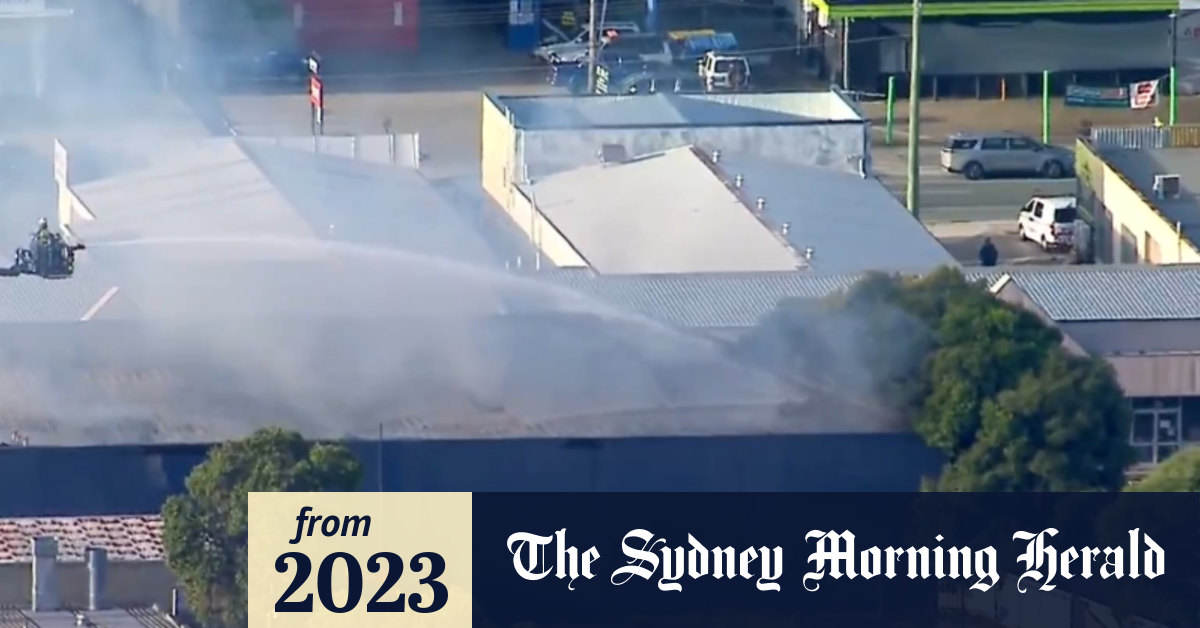 Video: Firefighters in hospital after Brisbane factory blaze