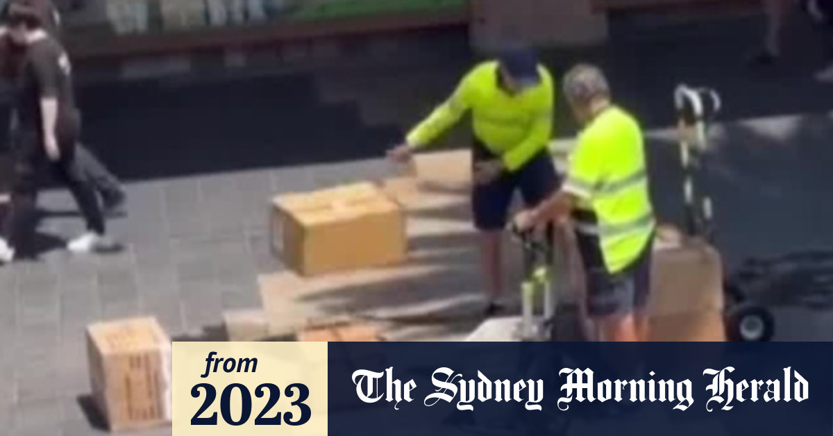 Video: Australia Post worker caught on camera throwing delivery boxes