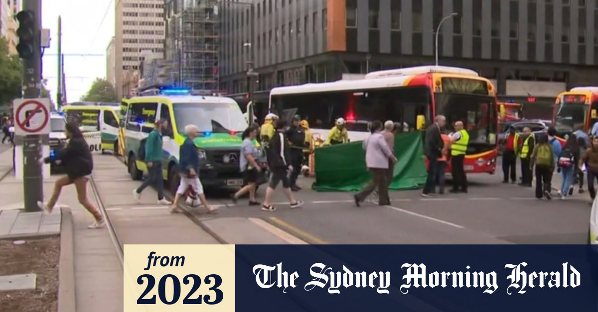 Video: Motorcyclist trapped under bus in Adelaide