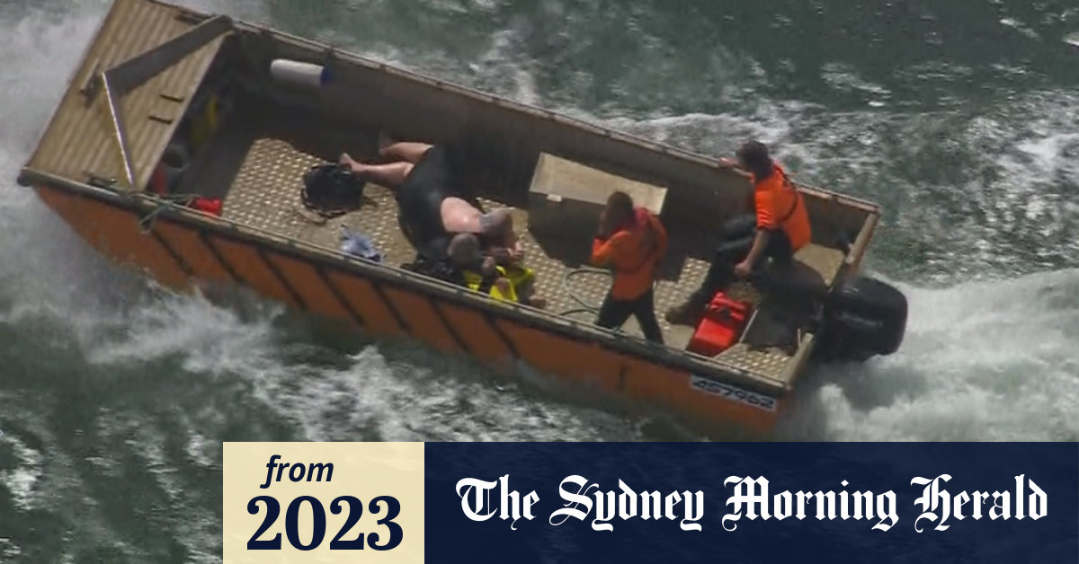 Video: Three men rescued after boat capsizes