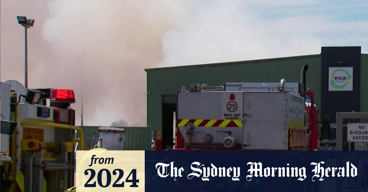 Video: Cardboard factory fire burns for hours