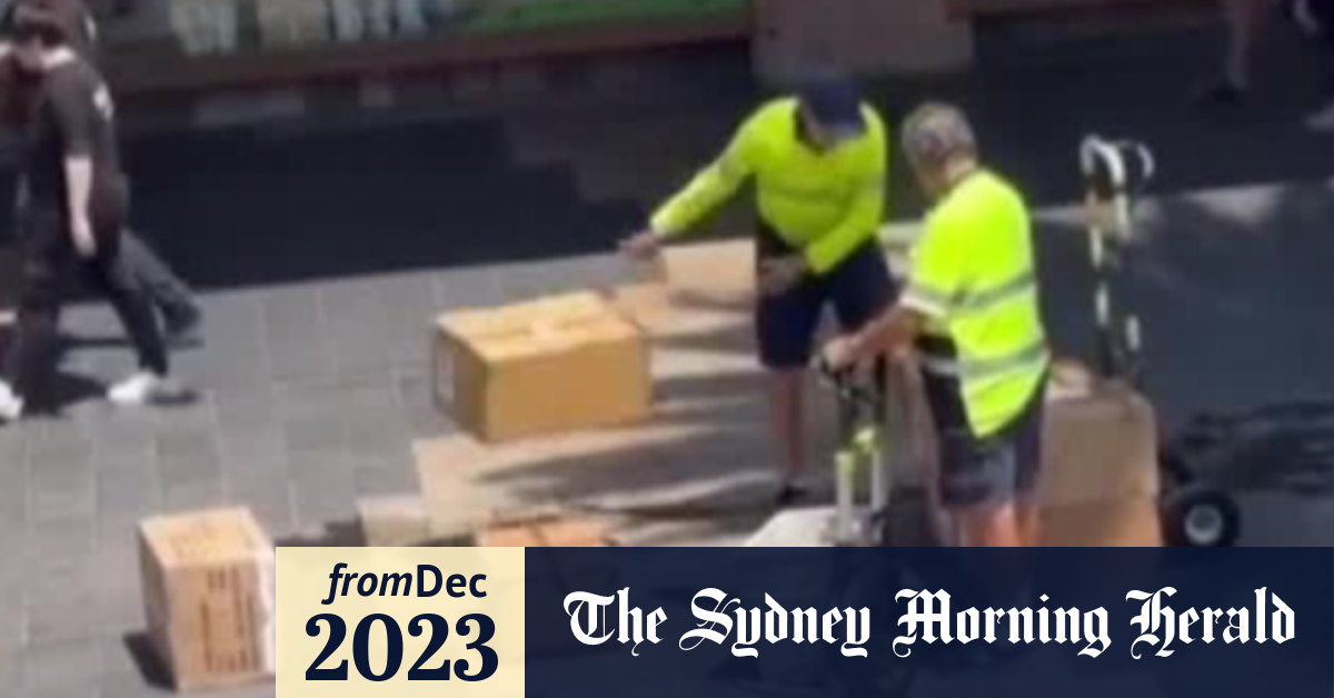 Video: Australia Post worker caught on camera throwing delivery boxes