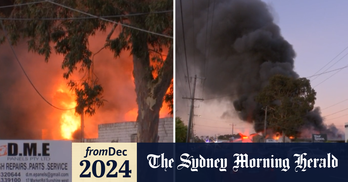 Video: Man hospitalised after mechanic shop fire in Melbourne