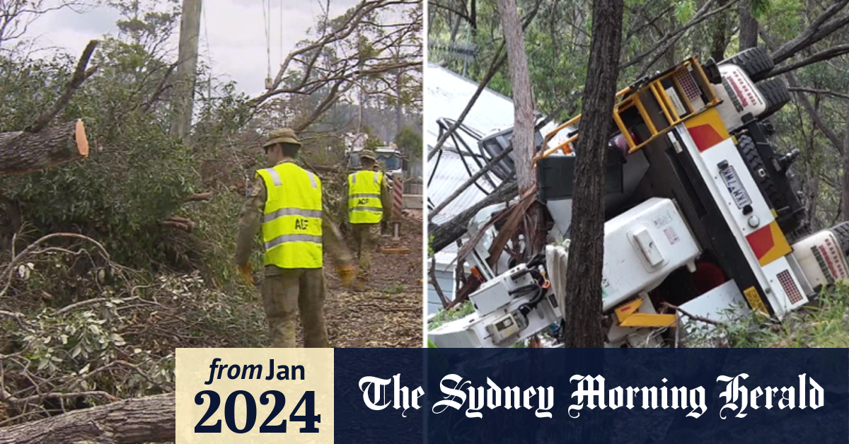Video: Cherry picker crashes during Queensland storm clean-up