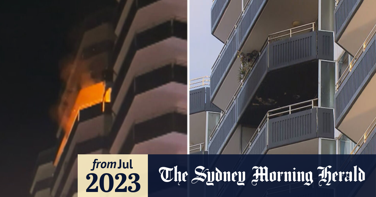 Video: Man filmed scaling building after escaping fire on the Gold Coast