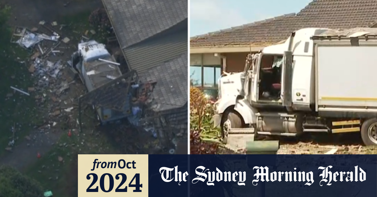 Video: Two dead after truck crashes into home