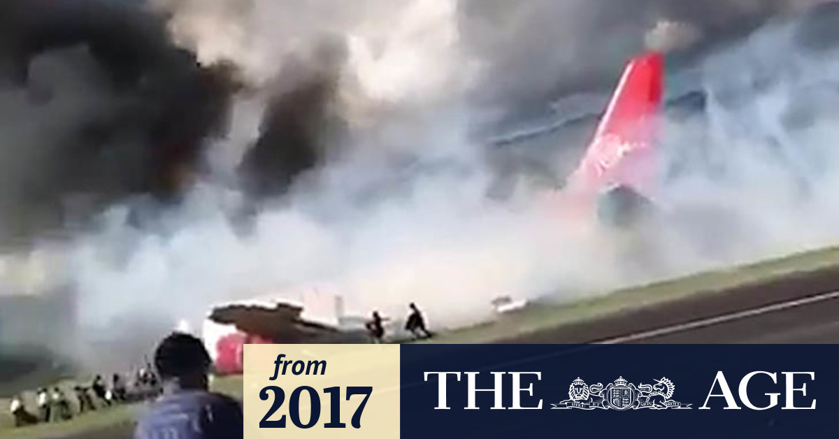 Video: Jet on fire as passengers flee