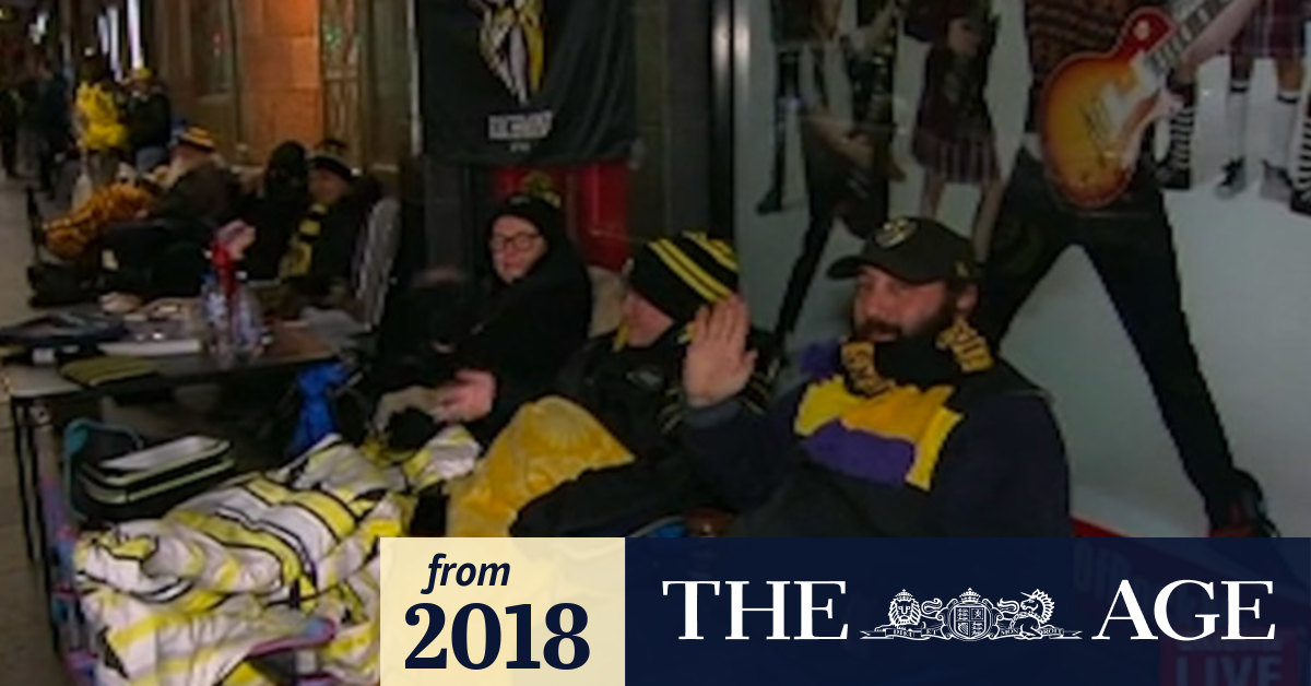 Video: Footy fans brave the cold for grand final tickets