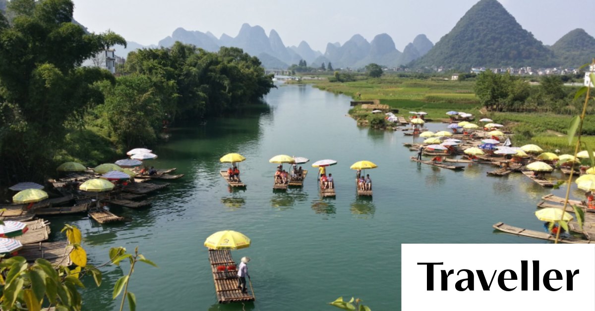 View from Dragon Bridge of punting on Yulong River, Yangshuo, Guangxi ...