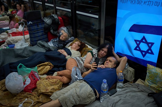 DFAT helps open escape path for Australians caught in Israel to flee ...
