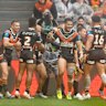 Wests Tigers players celebrate.